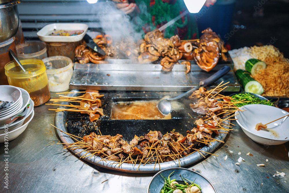 Yangon Myanmar (Burma). people sharing Traditional Burmese cuisine pork ...