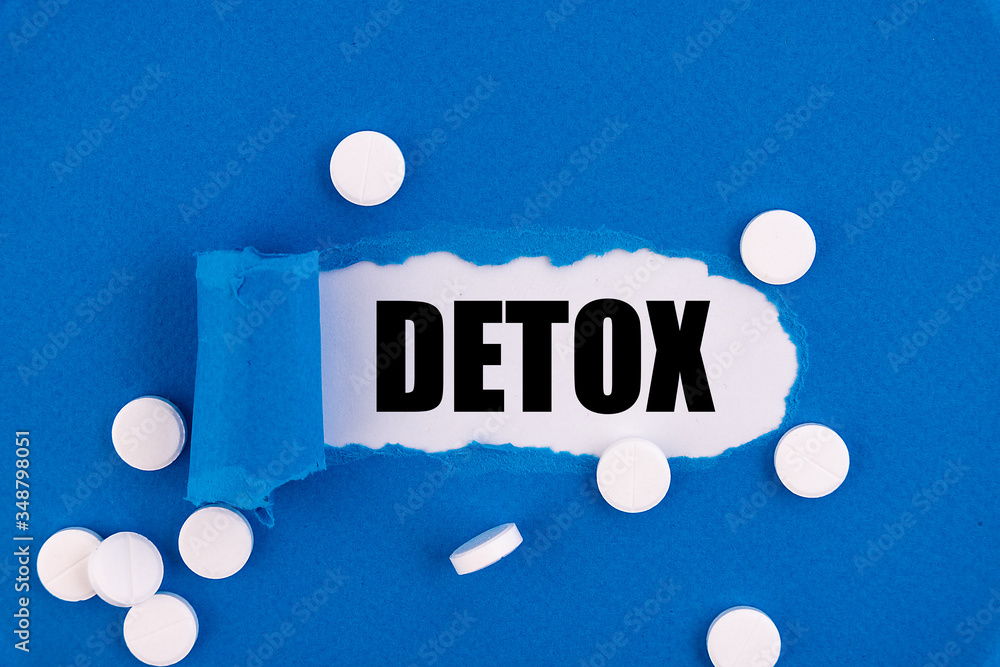 Detox word written under torn paper. Healthcare healthy diet fighting ...