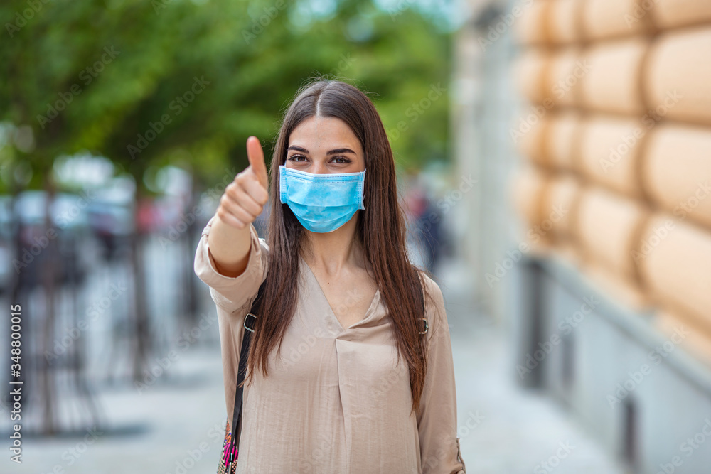 Happy positive girl, young cheerful beautiful woman in protective ...