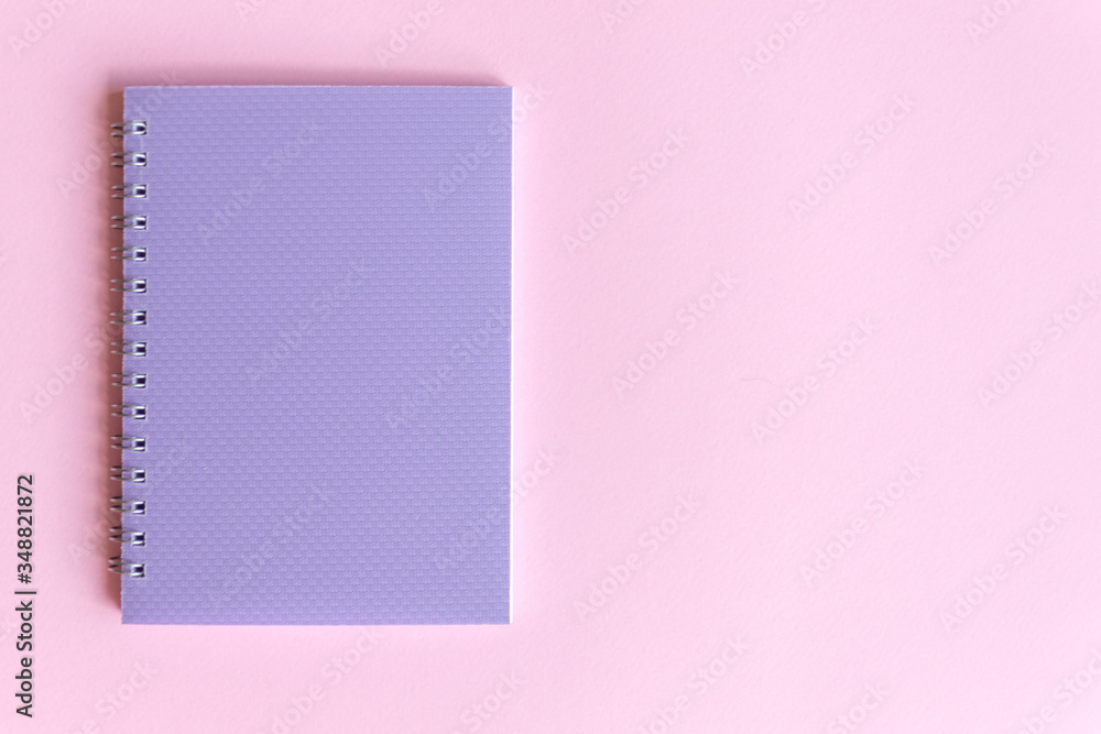 Colorful photography with purple notebook on pink background and free ...