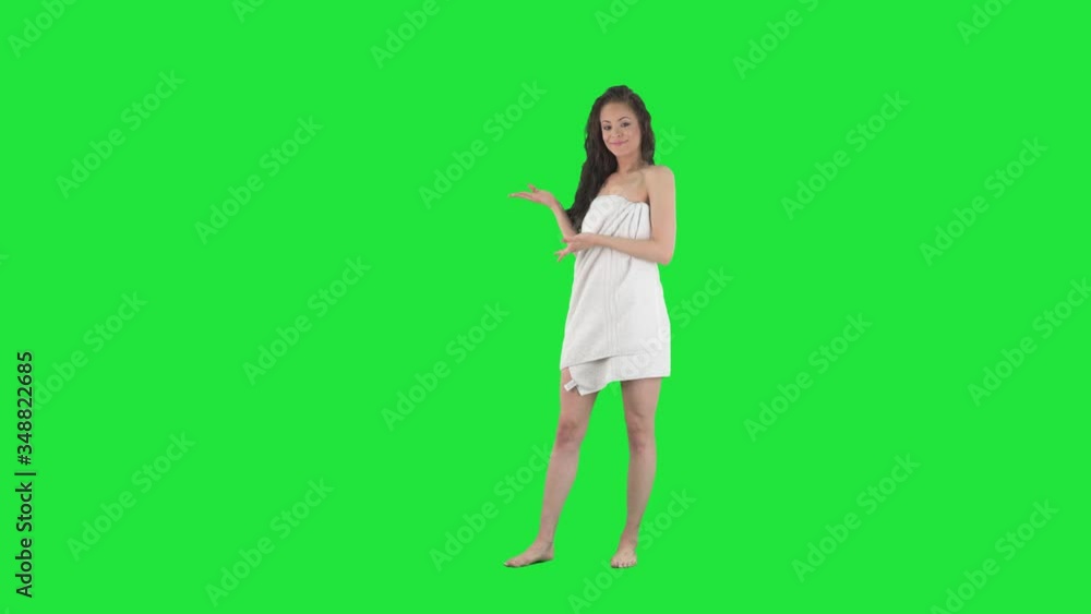 Vidéo Stock Attractive young woman in towel after taking shower showing ...