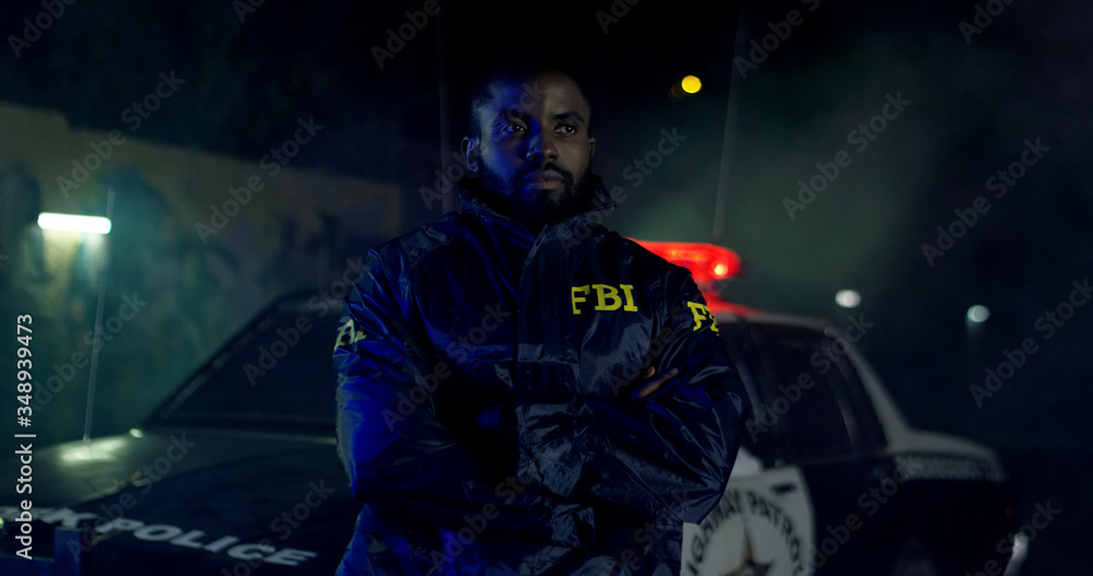 Portrait of police officer with serious faces. FBI agent work at the ...