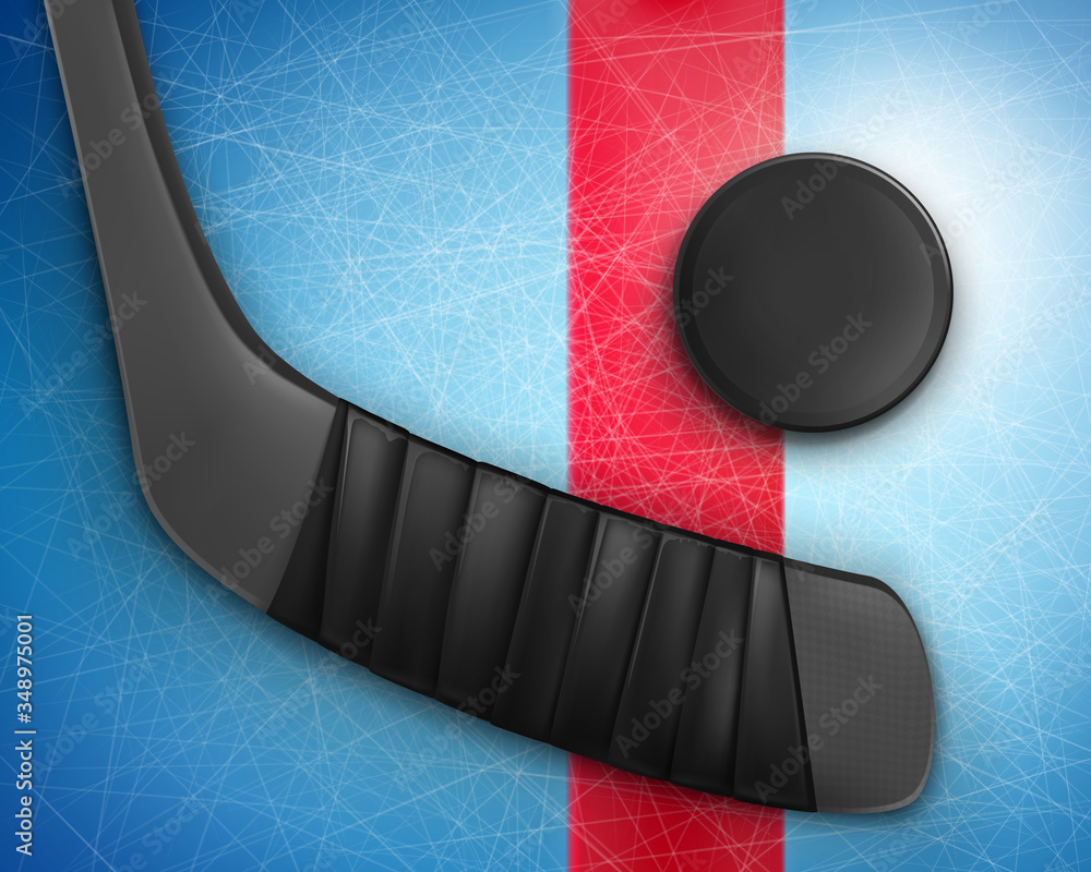 Wooden stick and black rubber puck on ice with traces from skates ...