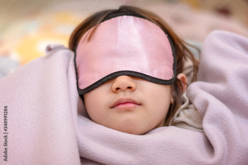 Young Girl Naps with an Eye Patch and a Cozy Blanket. Stock Photo ...