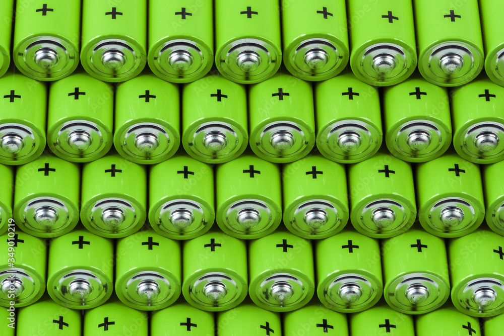 Row of AA Alkaline Batteries, Source of Green Energy Industry ...