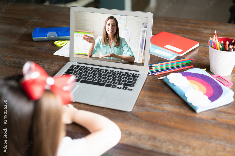 Little girl taking online classes Stock Photo | Adobe Stock