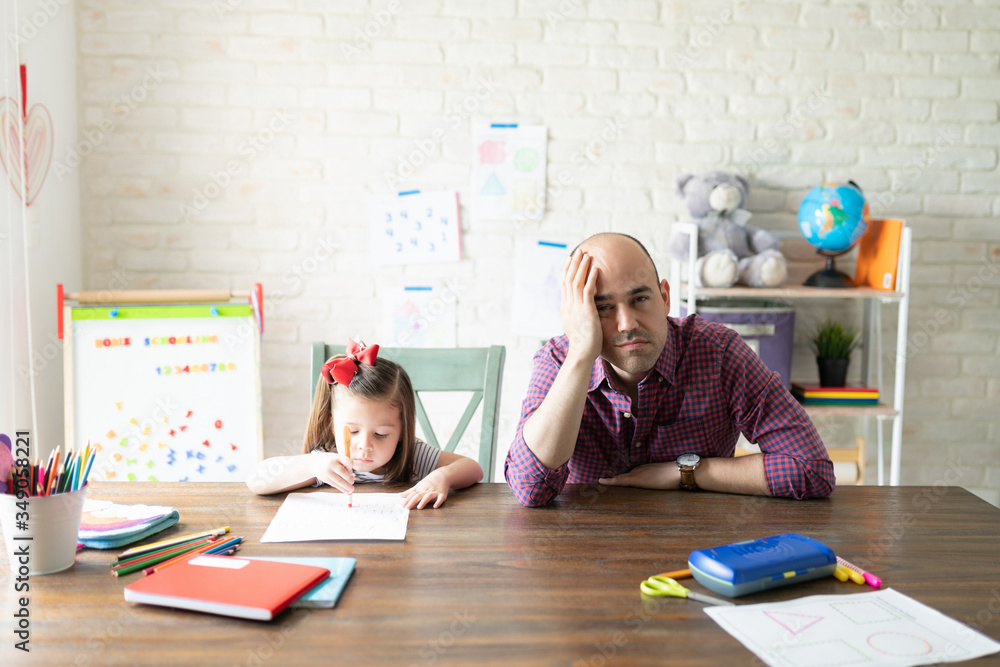 Stressed dad trying homeschooling Stock Photo | Adobe Stock