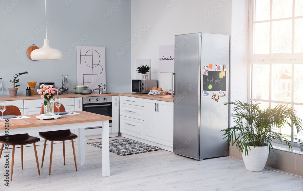 Interior of modern kitchen with refrigerator Stock Photo | Adobe Stock