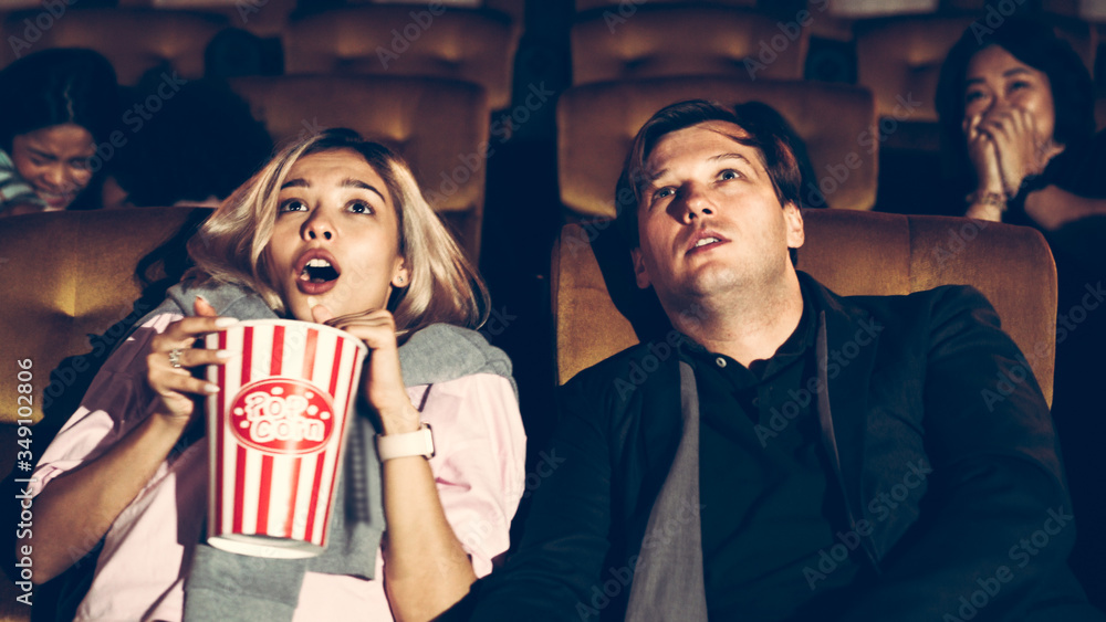 People audience watching movie in the movie theater cinema. Group ...