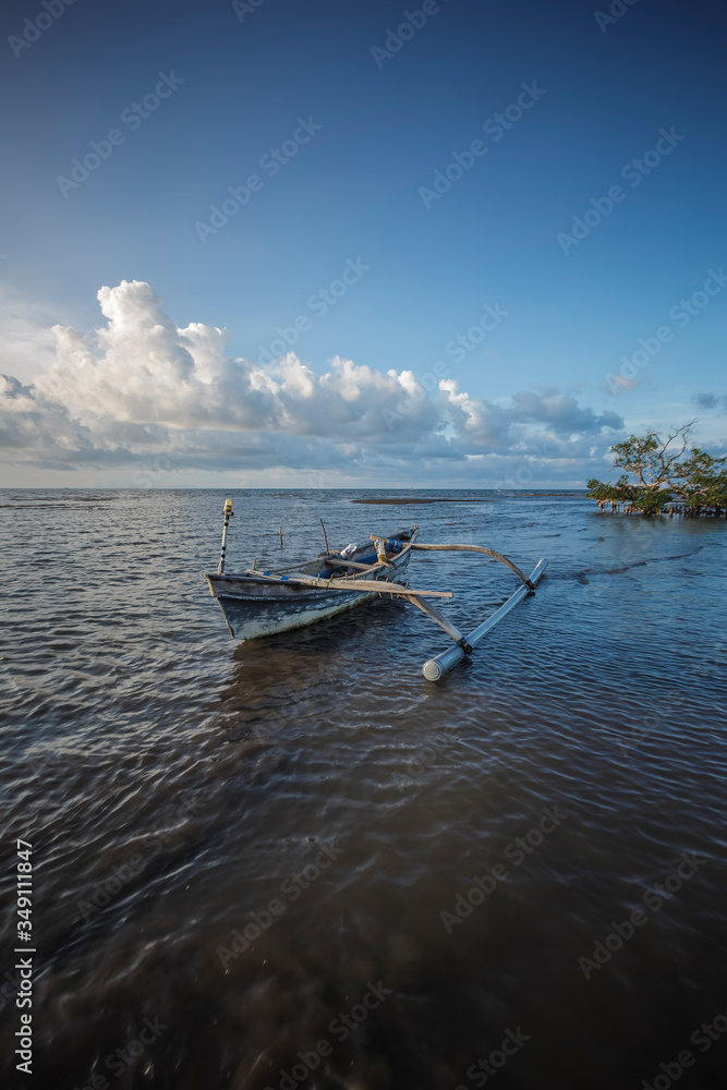 Indonesia traditional wooden ships and beautiful sand beach ...
