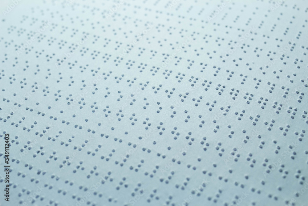 Foto de Braille alphabet pattern in a white sheet do Stock | Adobe Stock