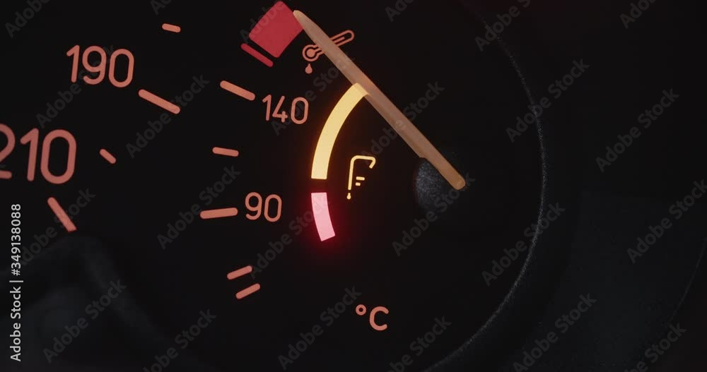 Car dashboard closeup - engine oil temperature gauge performing an oil ...