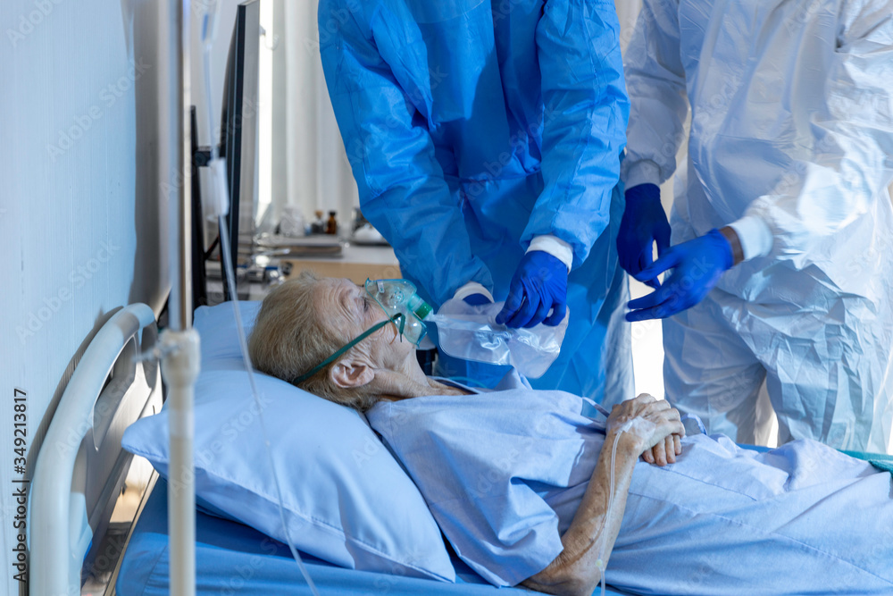 Old female Caucasian patient infected with virus receives oxygen ...