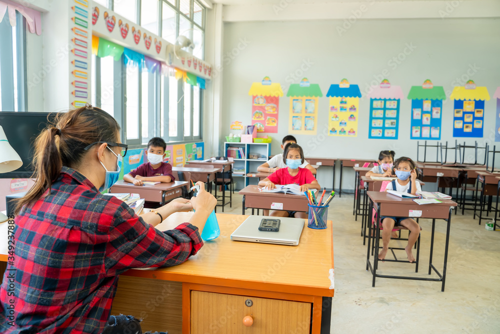 Teacher wearing protective mask to Protect Against Covid-19,Group of ...
