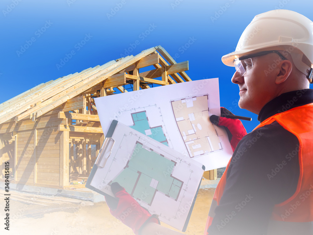 Builder is looking at work plan. Concept - construction business. Adult ...