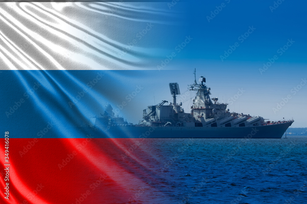 Russian Navy. Warship next to flag of Russia. Military ship is sailing ...