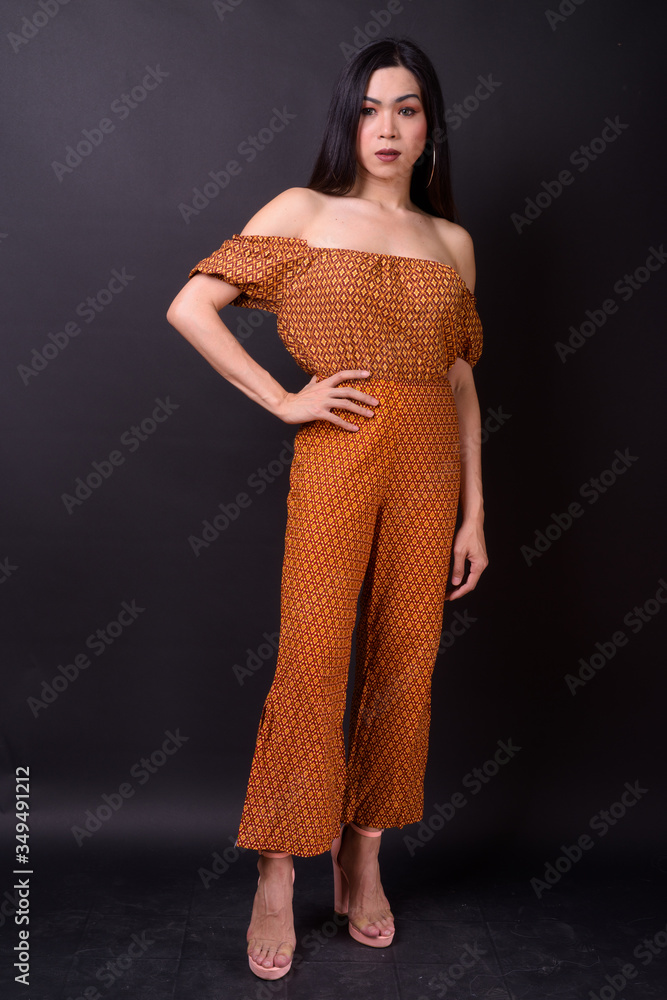 Full body shot of young beautiful Asian transgender woman Stock Photo ...