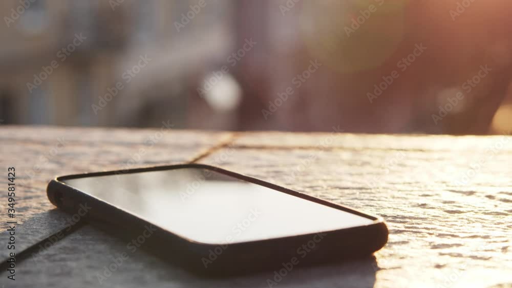 Close-up black modern smartphone cellular with black screen mock-up ...