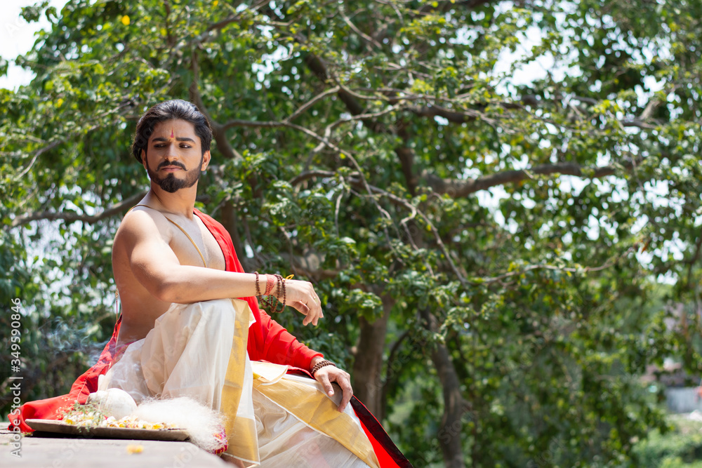 Portrait of an Indian pujari/ worshiper in bare body Indian ethnic ...