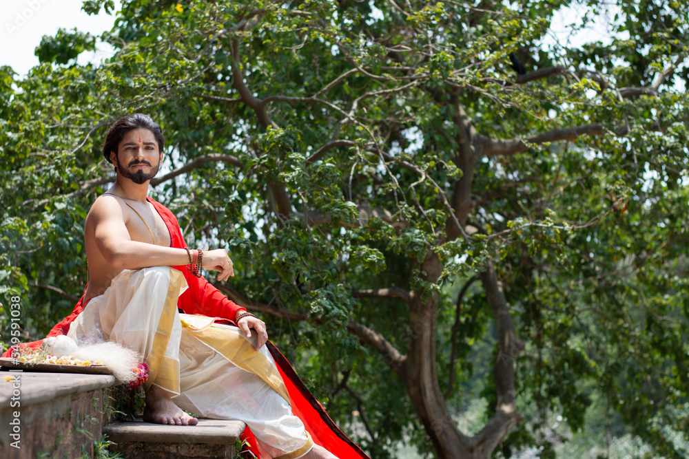 Portrait of an Indian pujari/ worshiper in bare body Indian ethnic ...