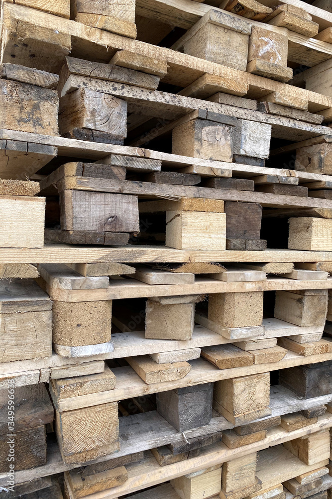 A range of wooden pallets. Inventory for shipment in the warehouse ...
