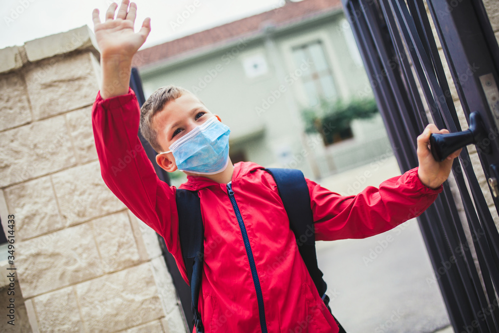 Child wear facemask during coronavirus and flu outbreak. The boy wear a ...