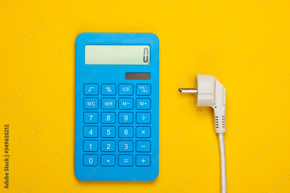 Calculator with a power plug on a yellow background. Calculation of ...