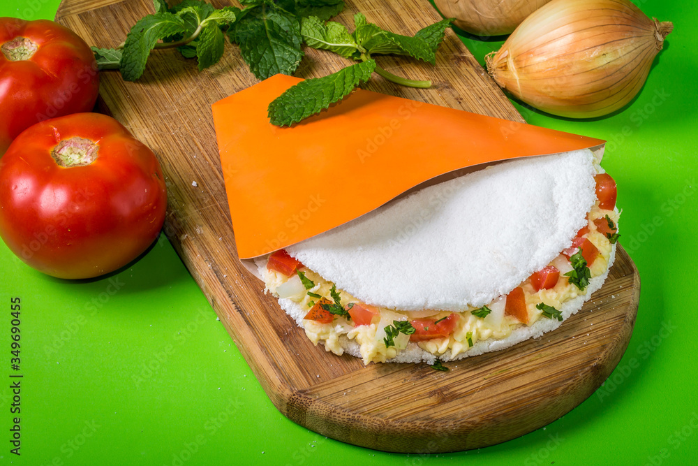 Tapioca with cheese, onion and tomato. Flatbread made from cassava also ...