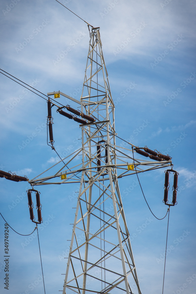 High voltage electric pole with wires. Line of electricity ...