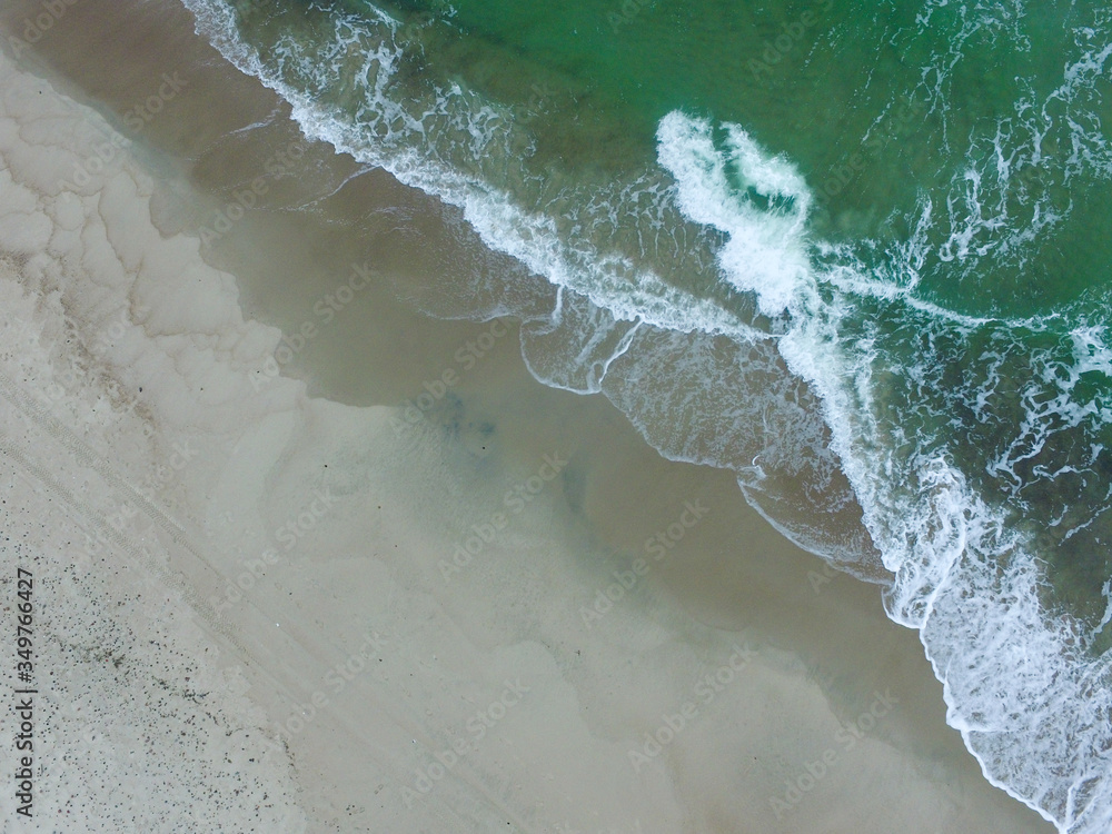 Top view of cold stormy and harsh Baltic sea. Empty off-season beach ...