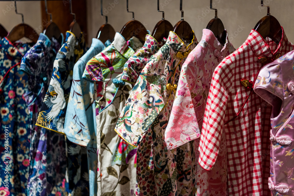 Chinese traditional cheongsam or Qipao, a type of feminine body-hugging ...