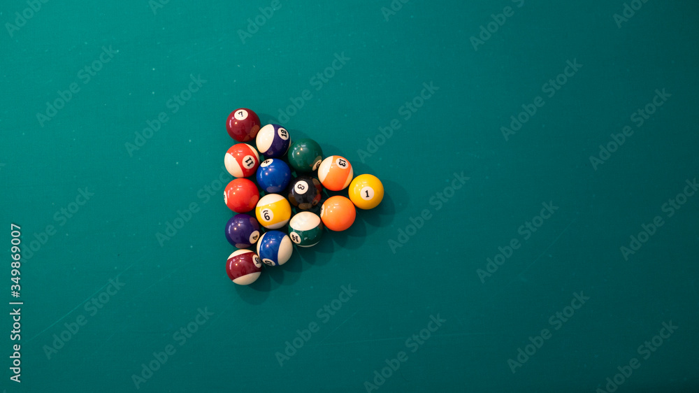 Sports game of billiards on a green cloth. Multi coloured billiard ...