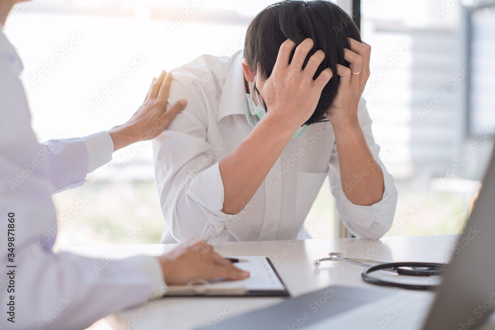 Patient receiving bad news, he is desperate and crying, Doctor support ...