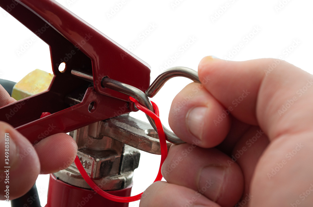 Fire prevention equipment concept with closeup on firefighter hand ...