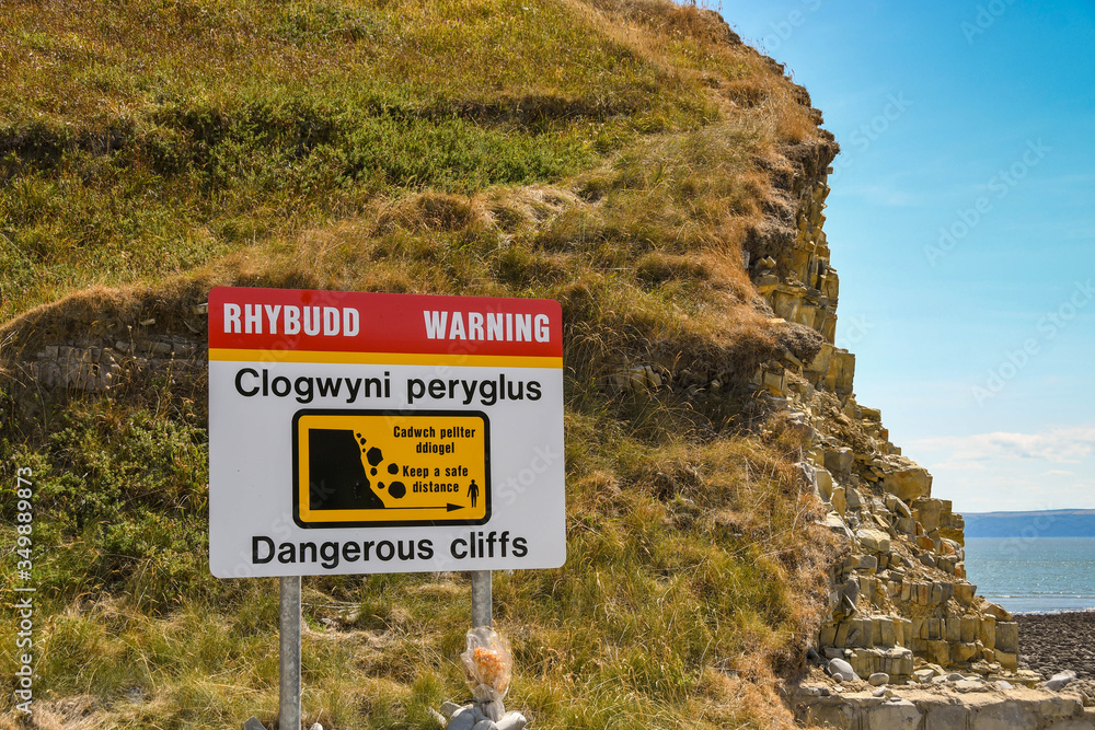 Bilingual sign in English and Welsh warning people of danger from ...