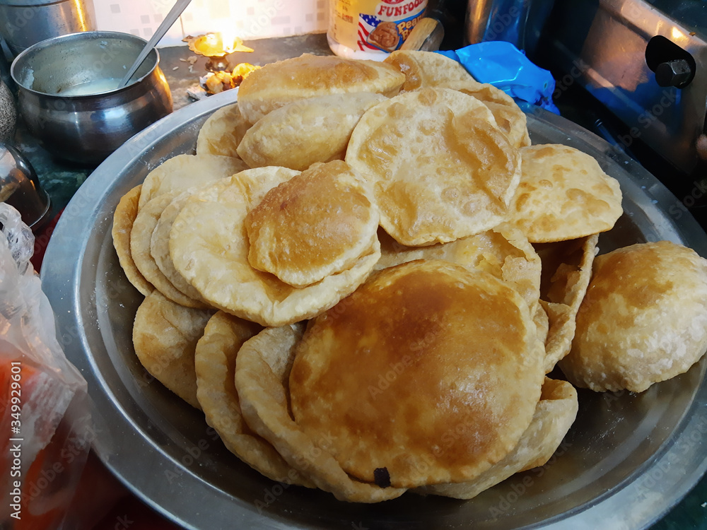 fried Puri in a frying pan. very popular street food in India.famous ...