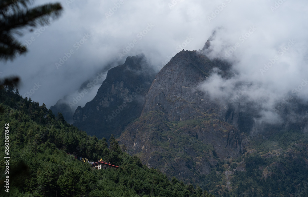 Buddhist monastery high in the forest mountains of Nepal in the way to ...
