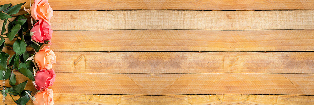 Handmade roses layout on wooden background. Background layout with free ...