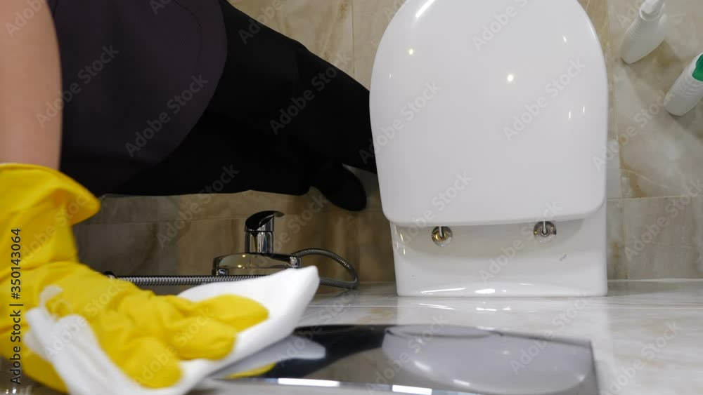 Cleaning service company. Top view. Cleaning chrome-plated button of ...