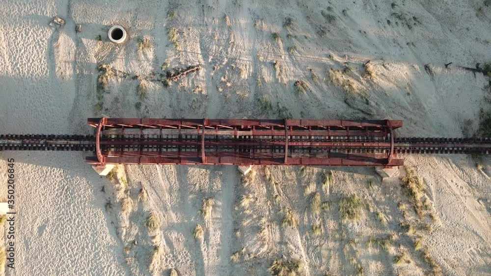 4K aerial drone video view of historical railway bridge on main B6 road ...