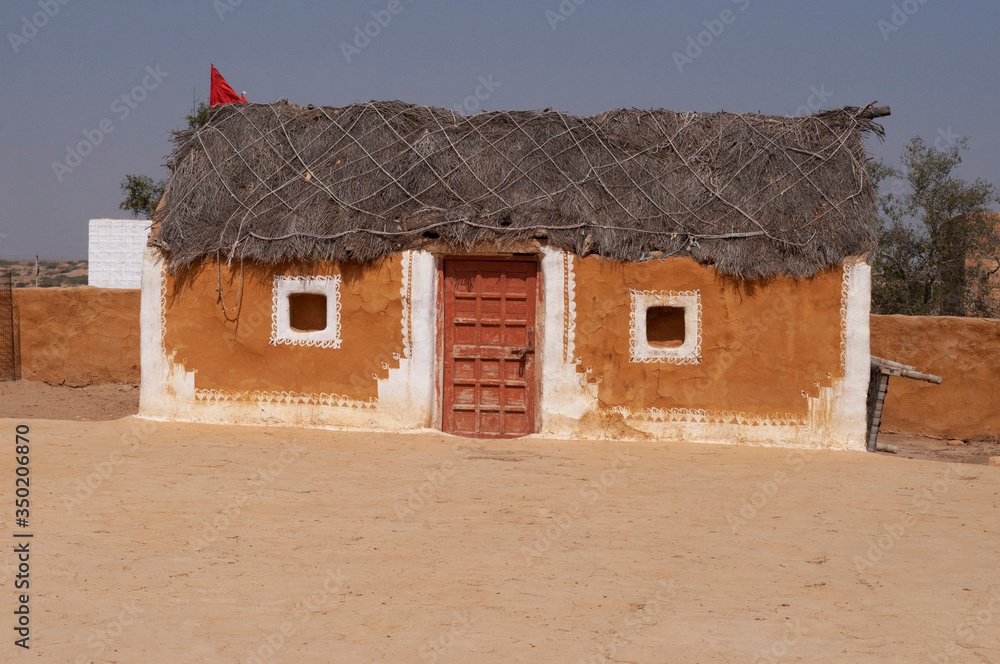 Khuri village with traditional-style hut with clay-and-dung walls and ...
