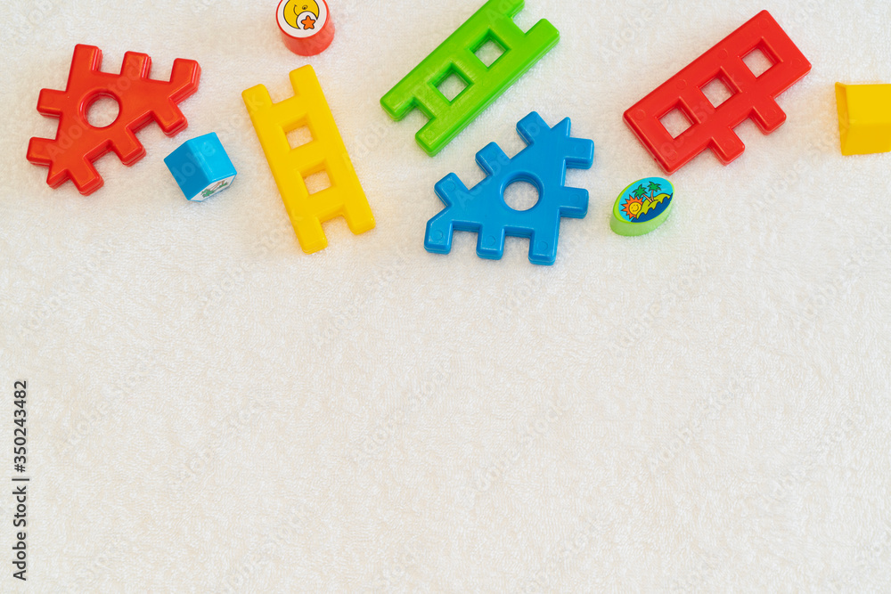 Colorful puzzles for kids on white background with copy space. Baby`s ...