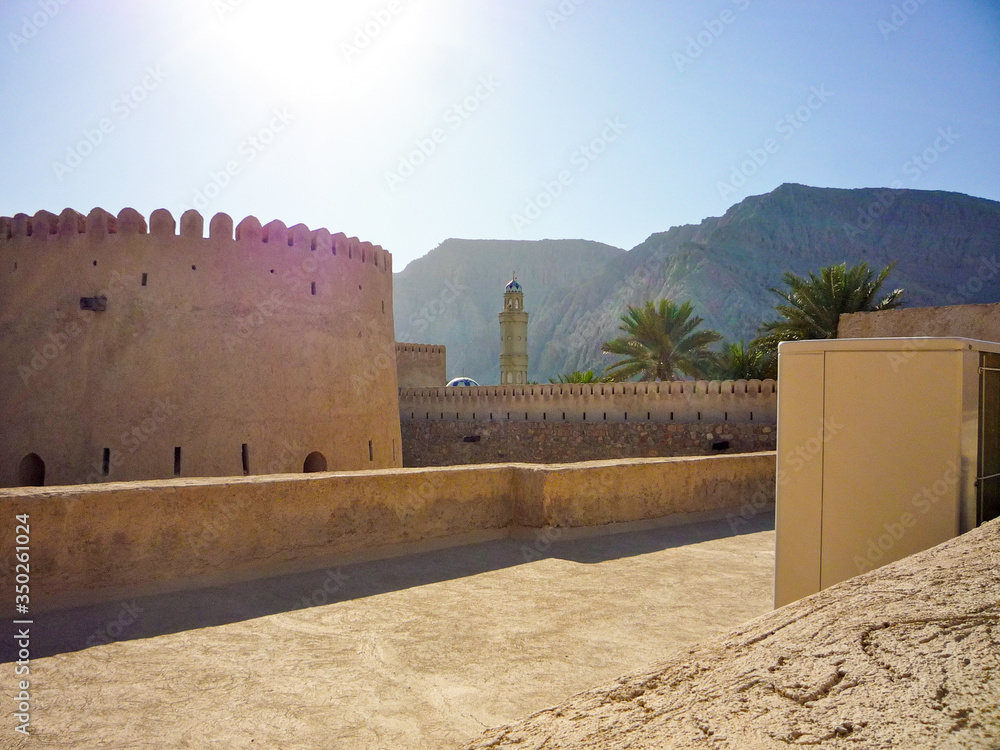 Old walls of Khasab Fort in Al-Chasab in Oman with towers in ...