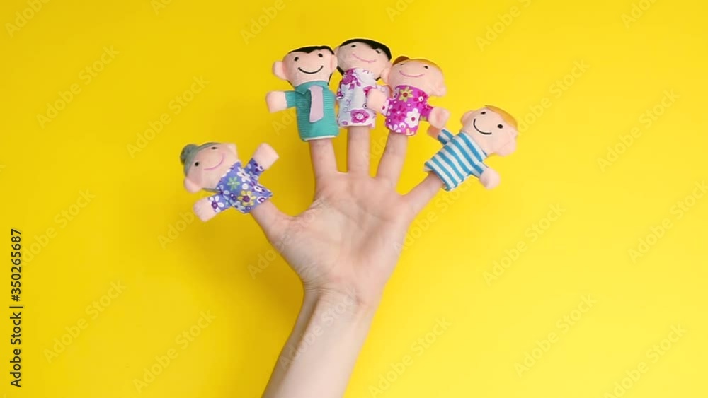 family finger puppet theater. child hand with finger puppets: son ...