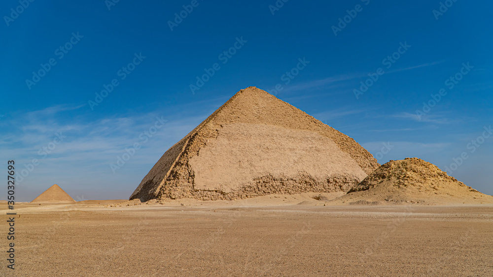 The Bent Pyramid is an ancient Egyptian pyramid located at the royal ...