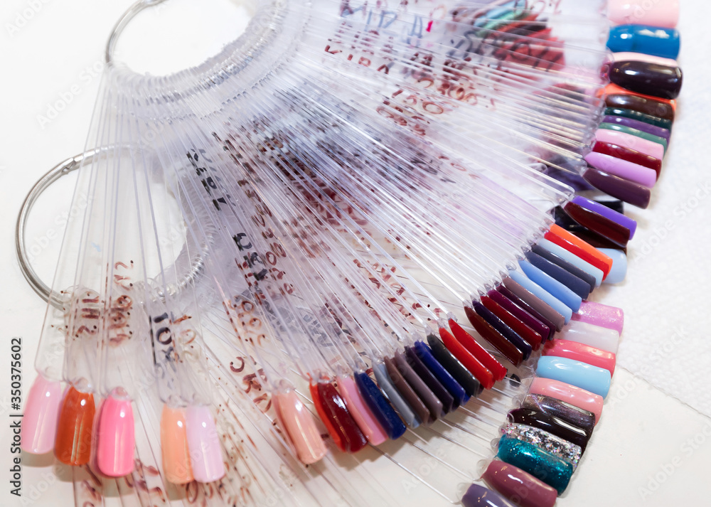 Nails variety samples for manicure. The color of Polish for manicure ...