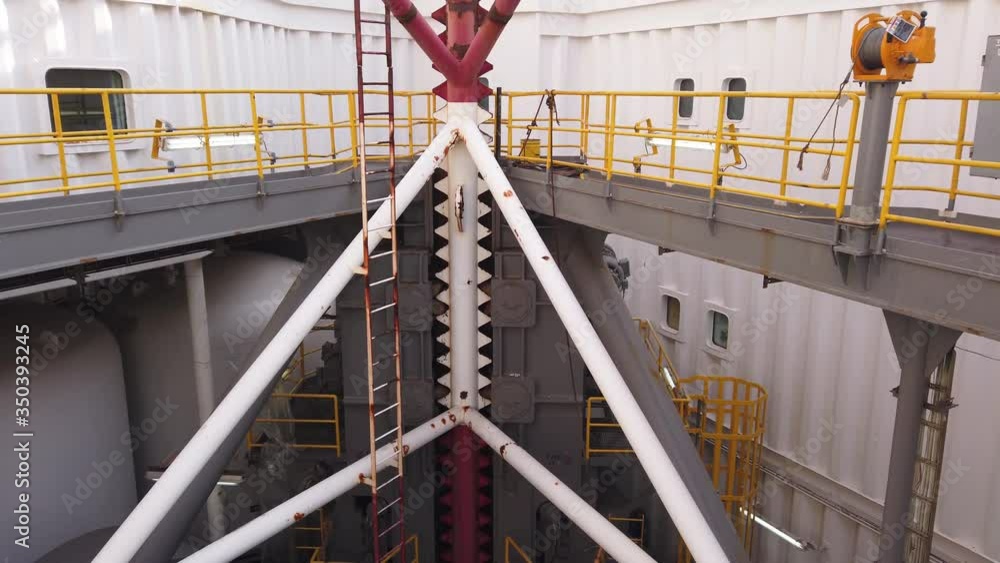 Offshore jack up drilling rig leg during jacking up. General view of ...