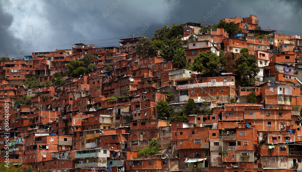 In the crowded and troubled city of Caracas, Venezuela, residents build ...