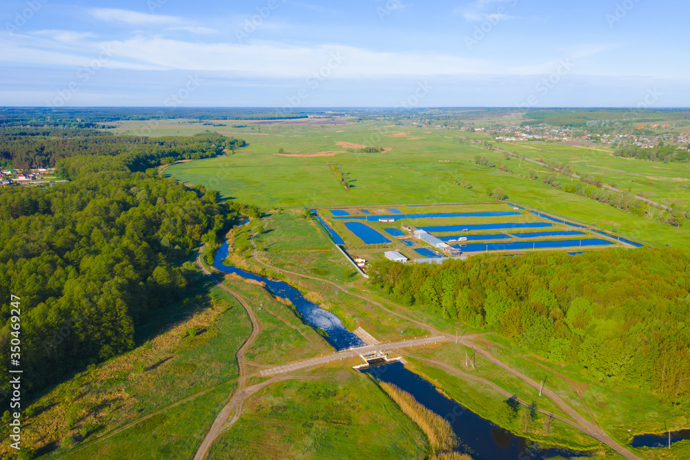 Aquaculture fisheries. Fish farming in the pond system. Small ponds ...