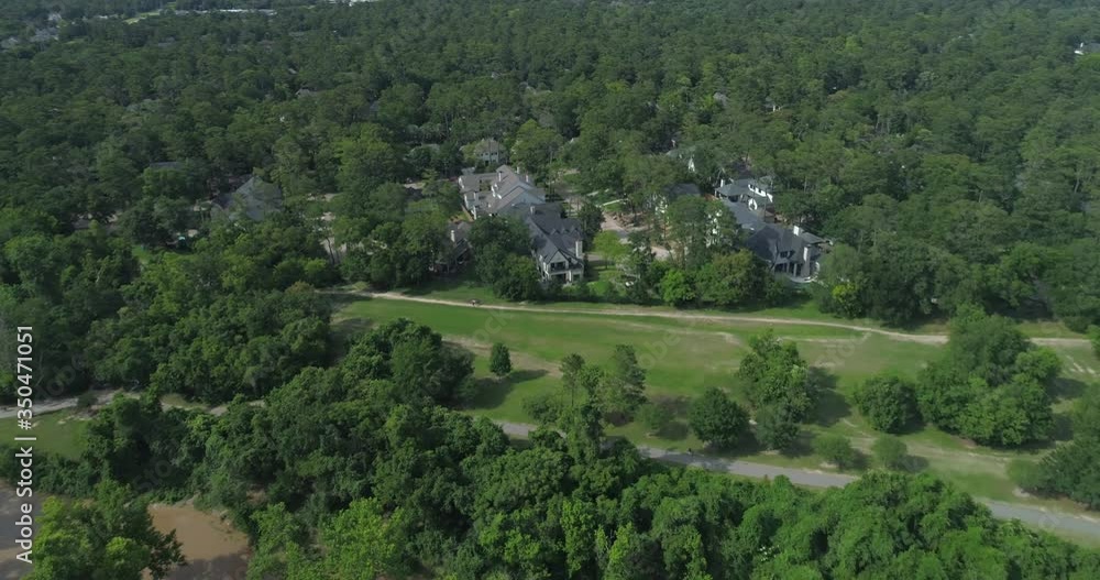 Aerial view of affluent homes next to the Buffalo Bayou in Houston ...